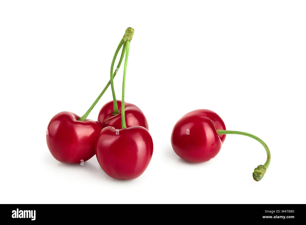 Sweet red cherries isolated on white background macro Stock Photo - Alamy