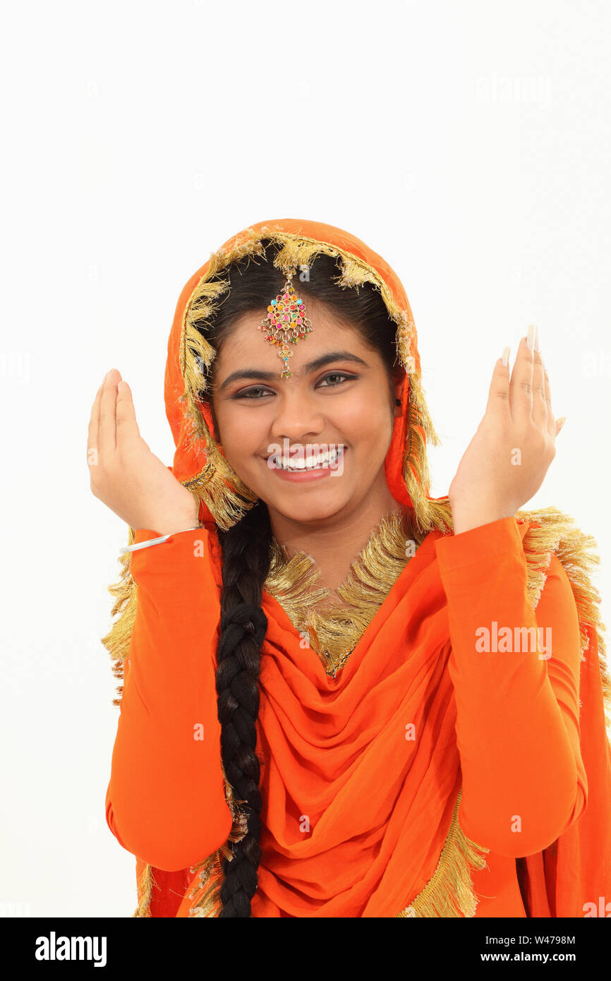 Young sikh woman smiling hi-res stock photography and images - Alamy