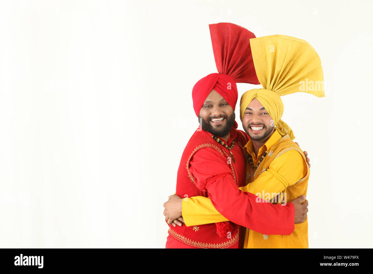 Indian two friends hugging and smiling Stock Photo - Alamy