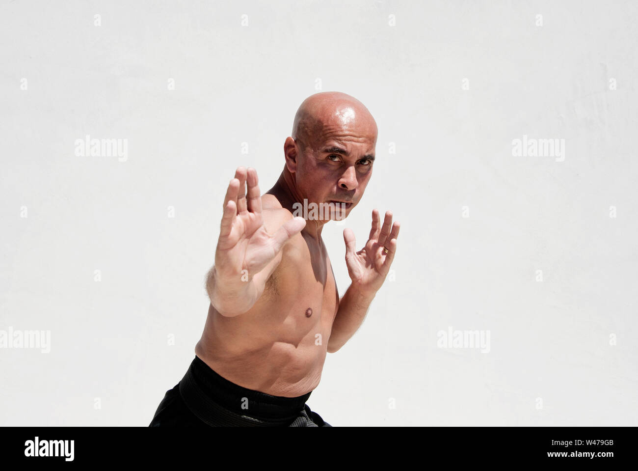 Older karate fighter practicing hi-res stock photography and images - Alamy