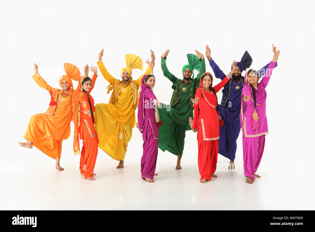 Group of people performing folk dance Stock Photo - Alamy