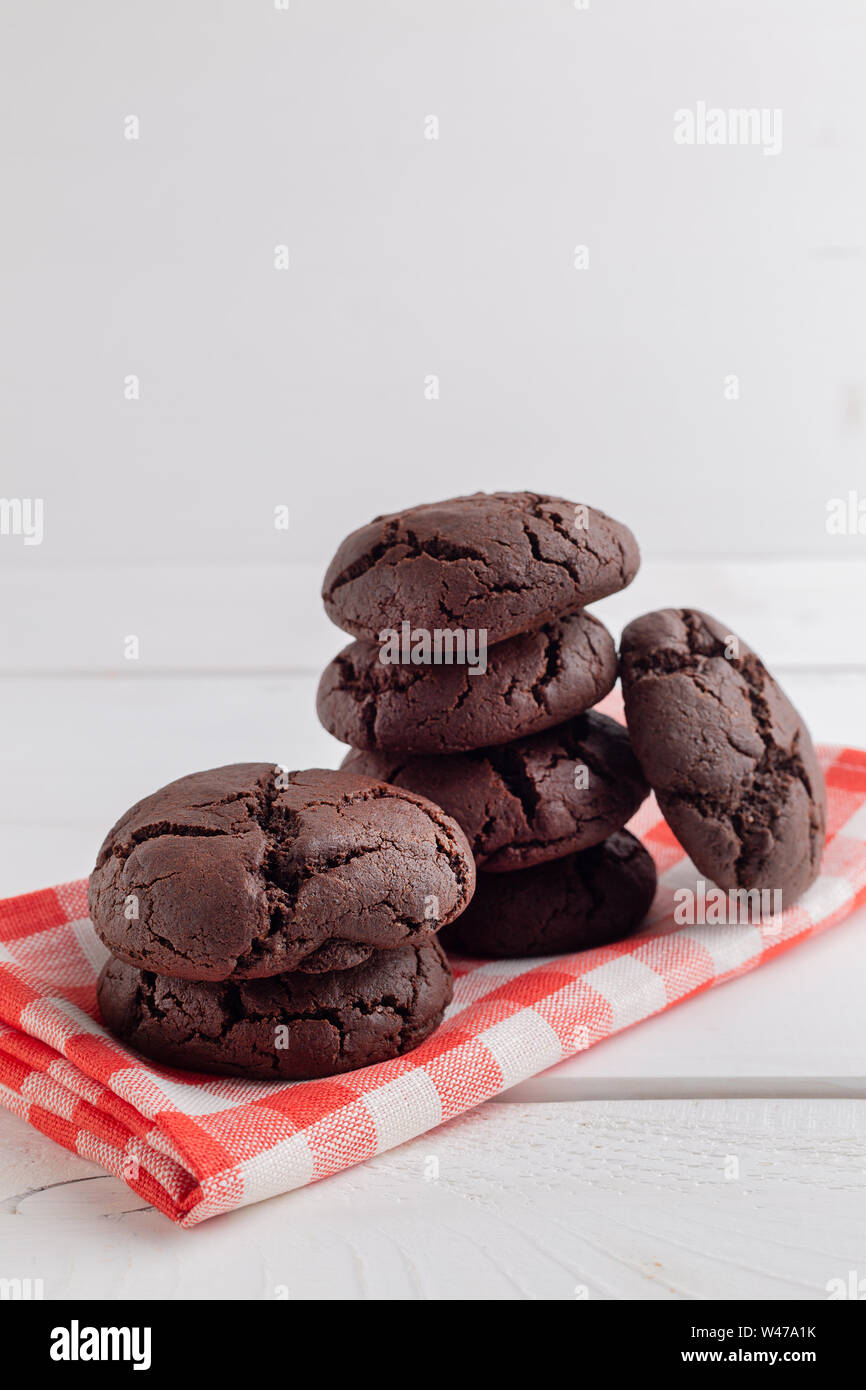 Homemade chocolate cookies fresh from the oven on white background ...