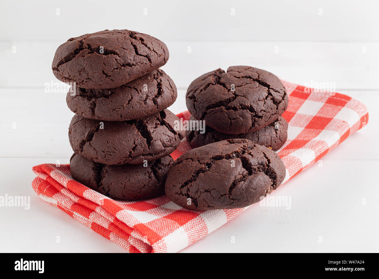 Homemade chocolate cookies fresh from the oven on white background ...