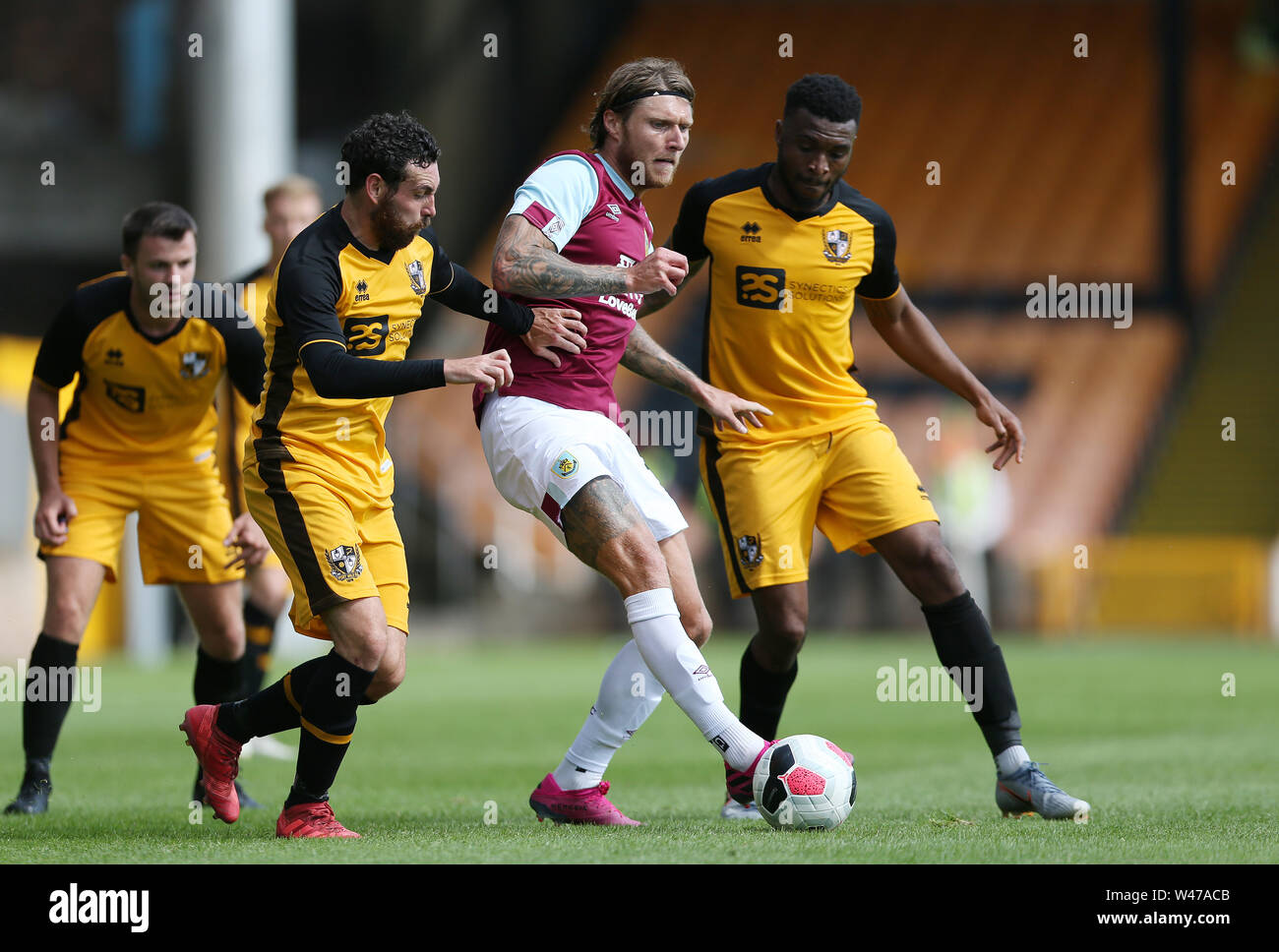 Port Vale's David Amoo and David Worrall battle for the ball with ...