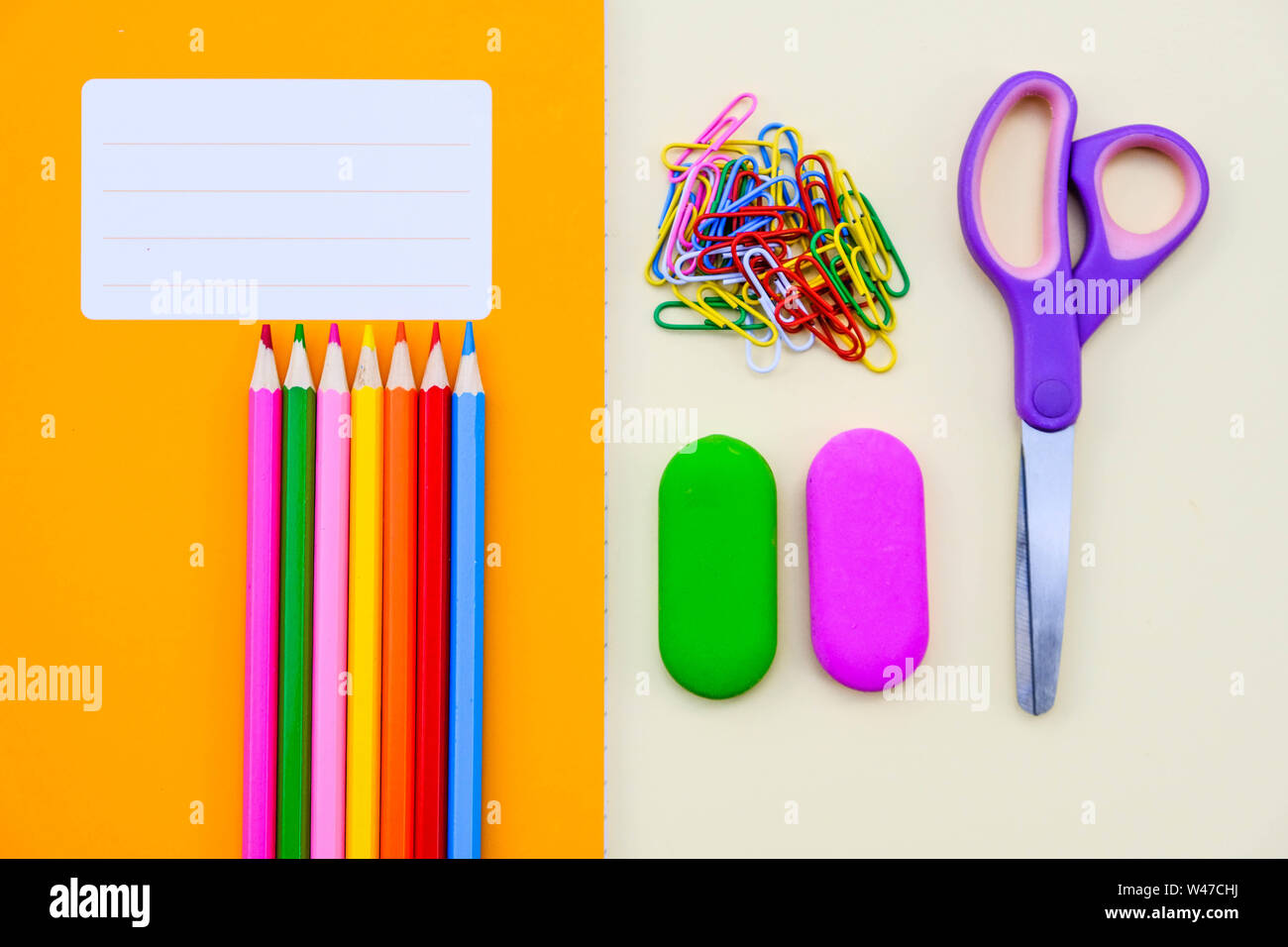 Back To School Workbook or Exercise Book and Coloured Pencils With ...
