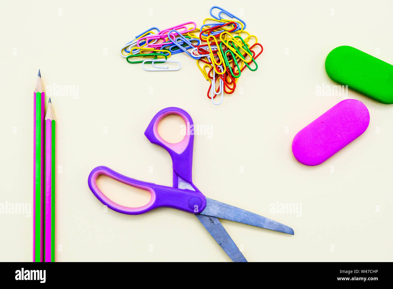 Back To School Coloured Pencils Rubbers Scissors and Paperclips Stock ...