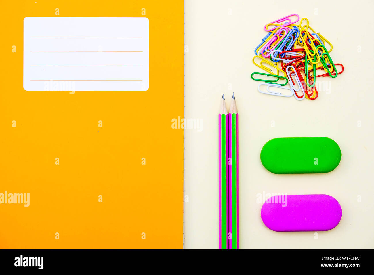 Back To School Workbook or Exercise Book and Coloured Pencils With ...