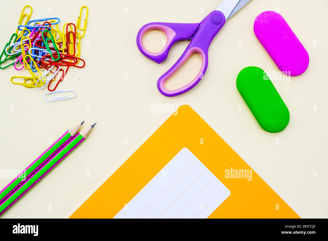 Back To School Workbook or Exercise Book and Coloured Pencils With ...