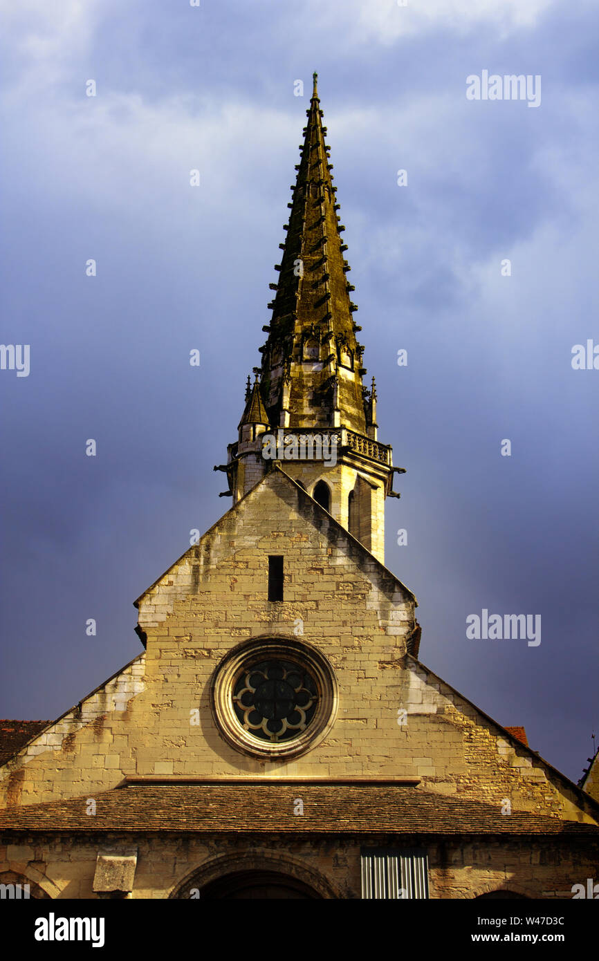 Temple pediment with round rose window and bell tower. Dijon Stock ...