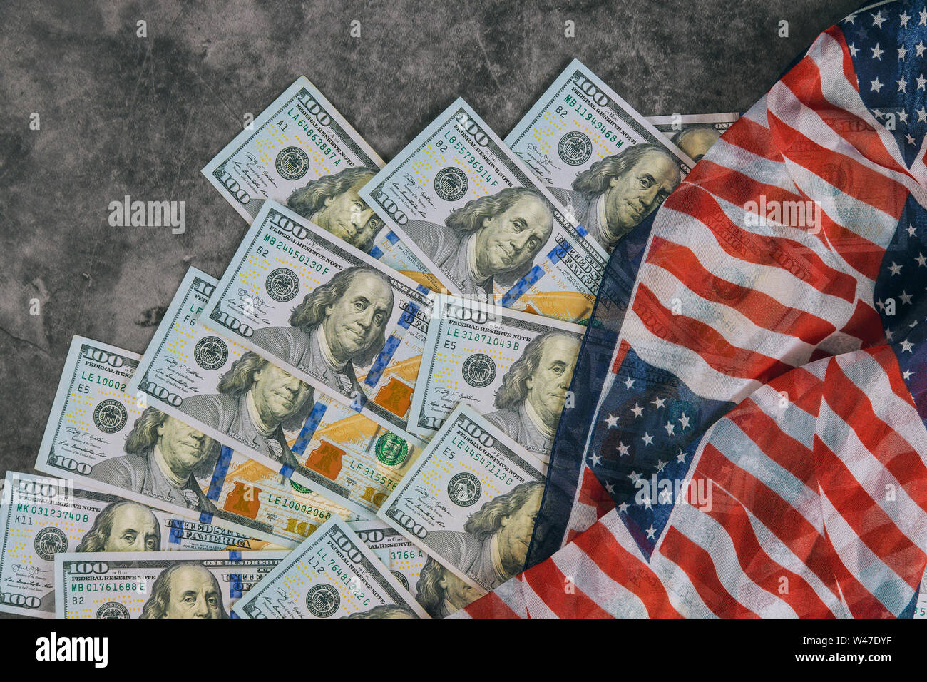 American flag and banknotes 100 USA dollar bill in the USA financial ...