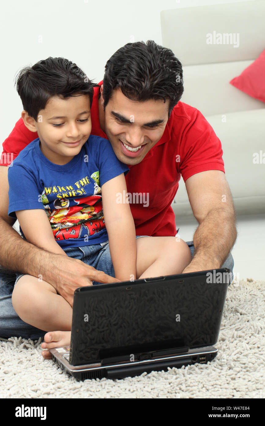 Indian male son using hi-res stock photography and images - Alamy