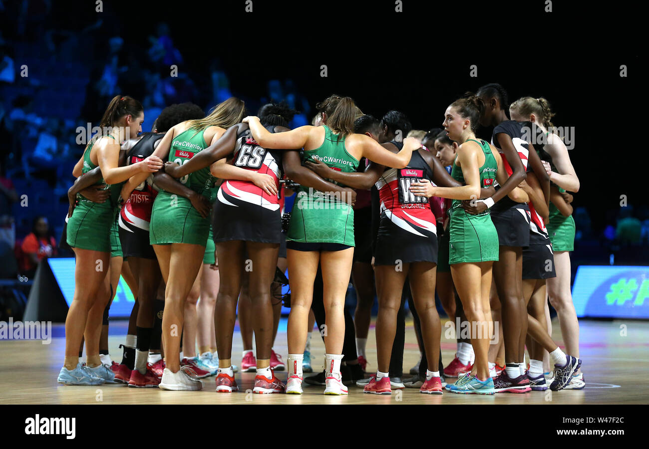 Both teams huddle in the match between Northern Ireland and Trinidad ...