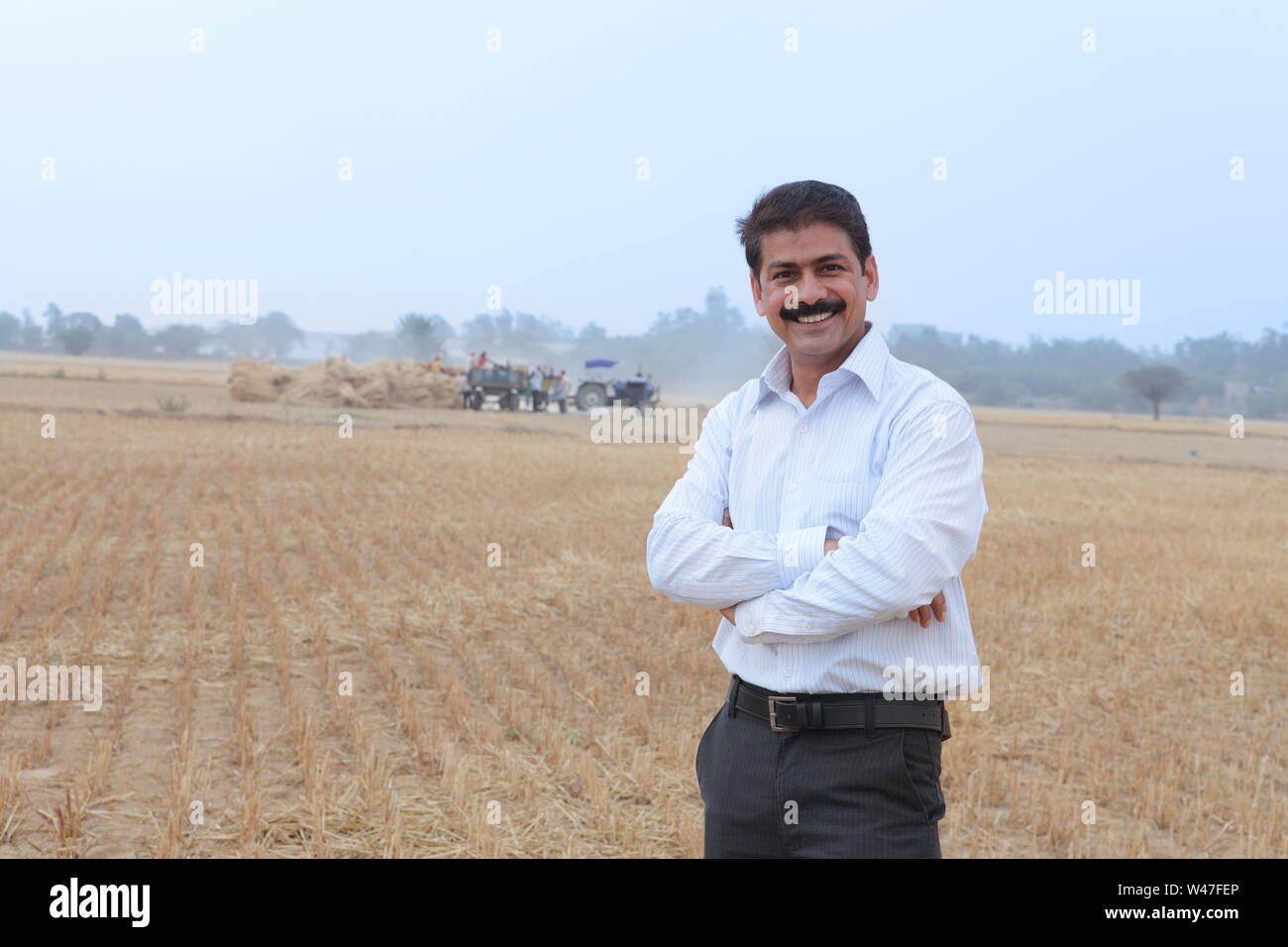 Rural indian man in office hi-res stock photography and images - Alamy