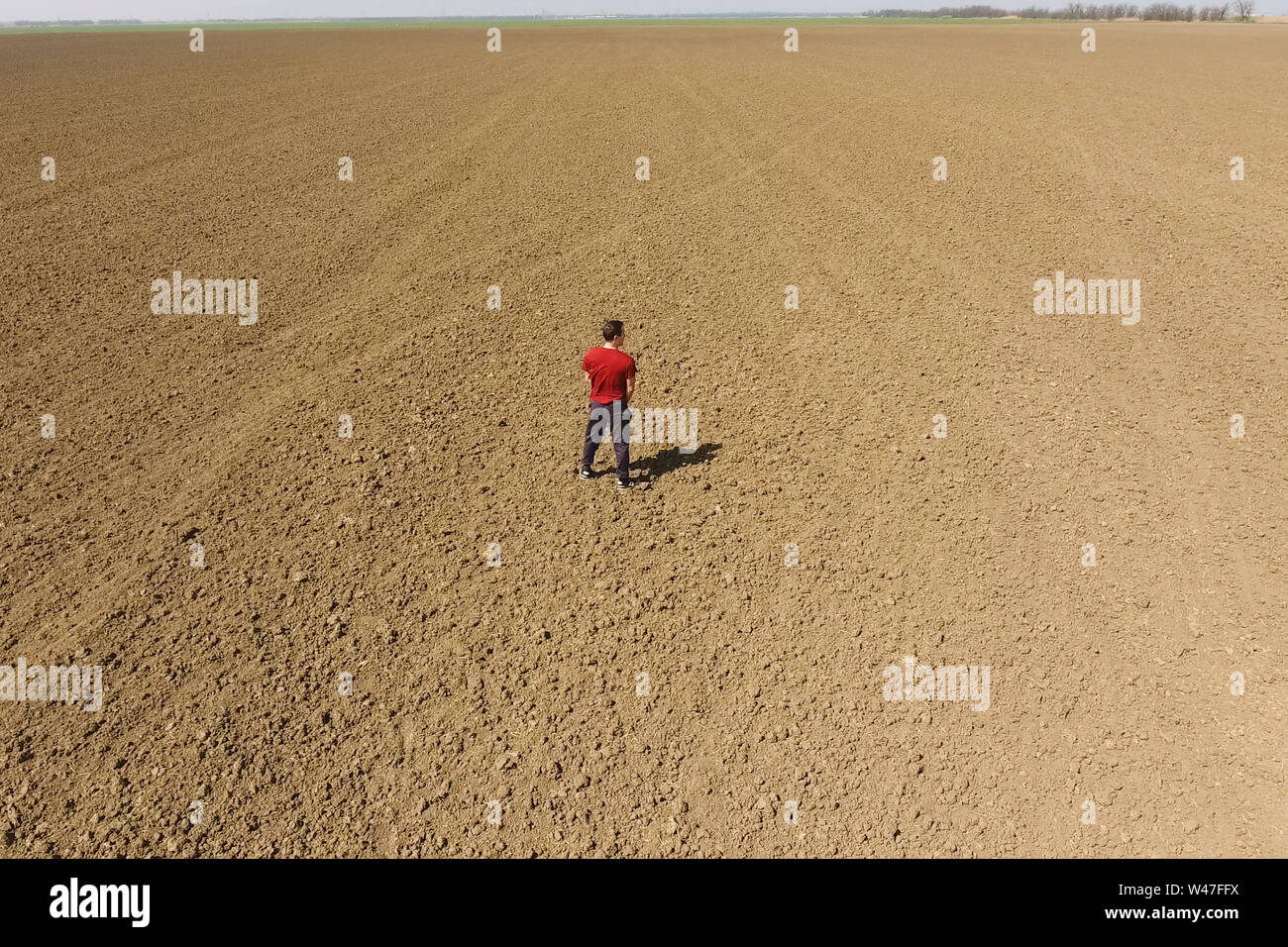 A man pisses in the open field. Urination in nature Stock Photo - Alamy