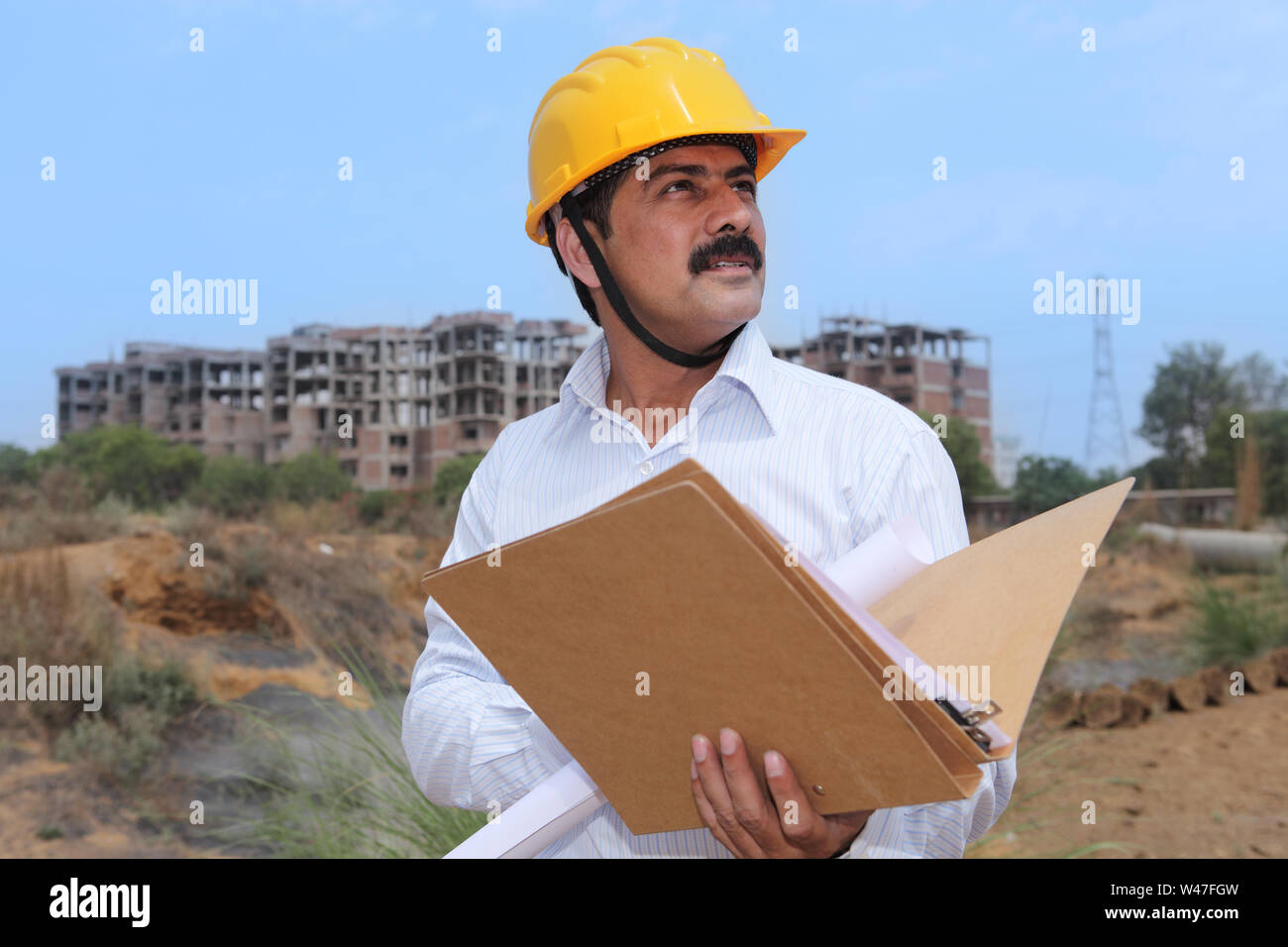 Architect doing paperwork Stock Photo - Alamy