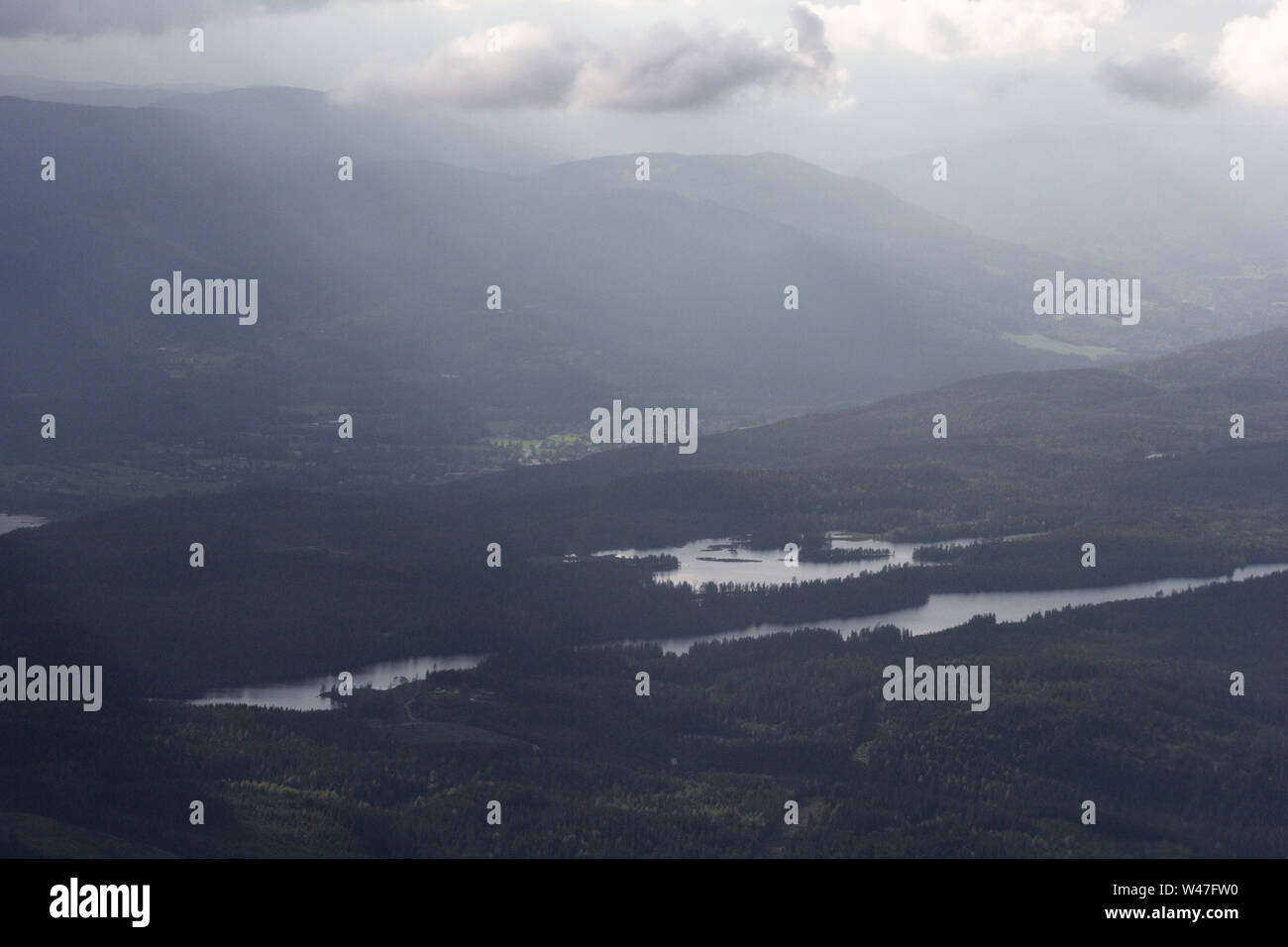 Bright sun through dark clouds hi-res stock photography and images - Alamy