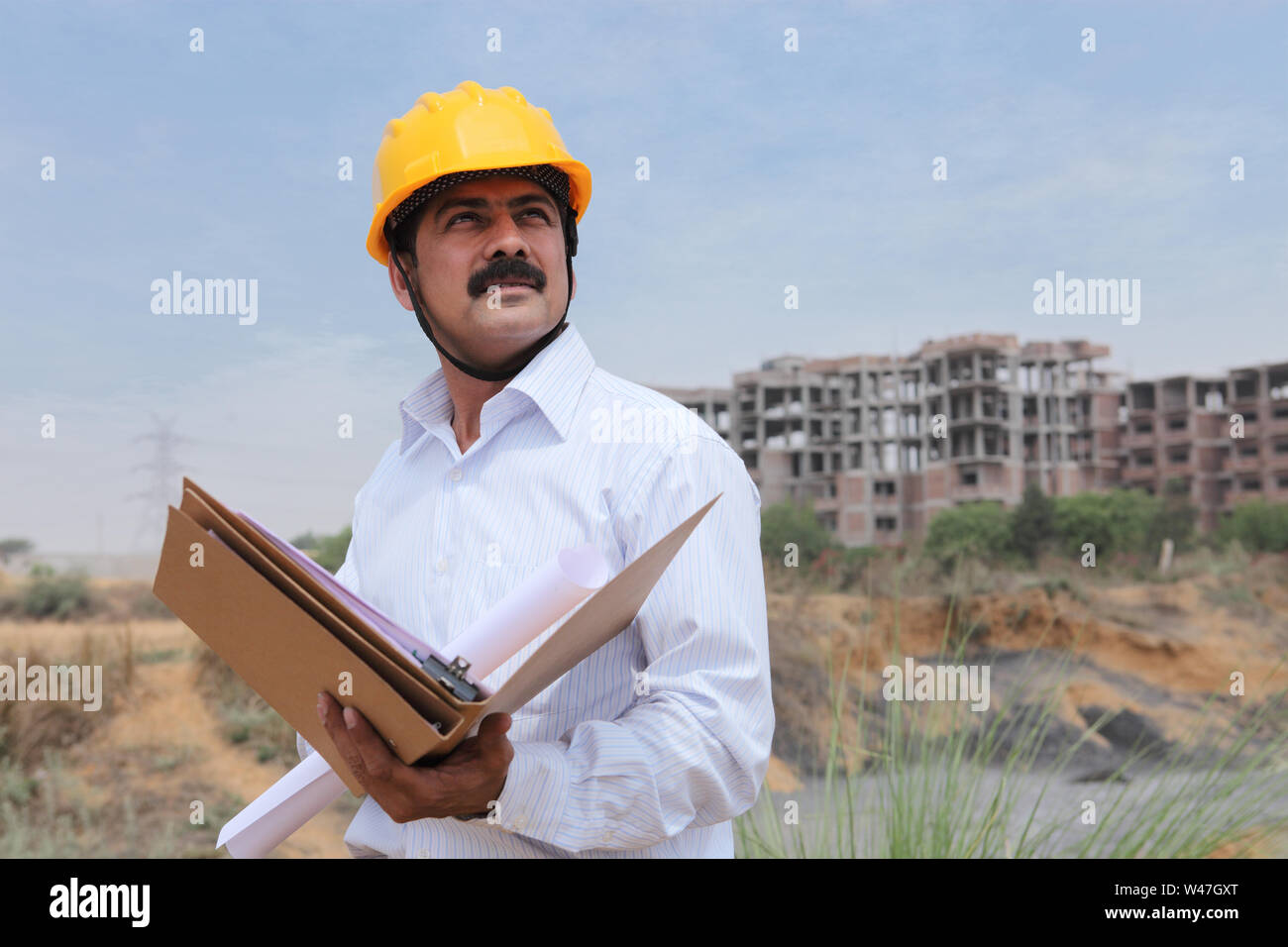 Architect doing paperwork Stock Photo - Alamy