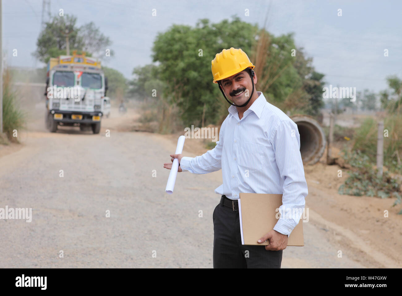 Indian male engineer inspecting site hi-res stock photography and ...