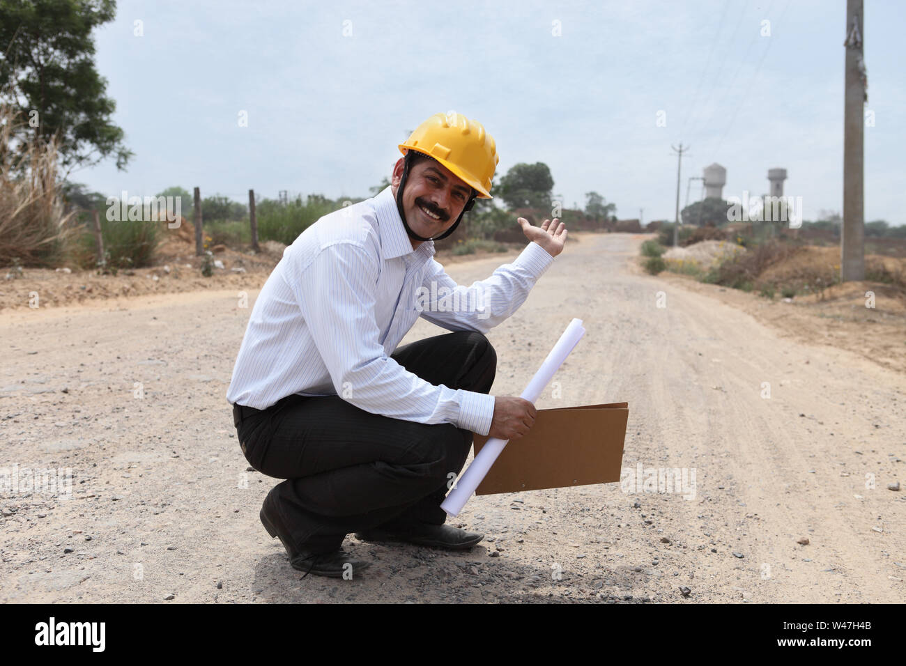 Indian male engineer inspecting site hi-res stock photography and ...