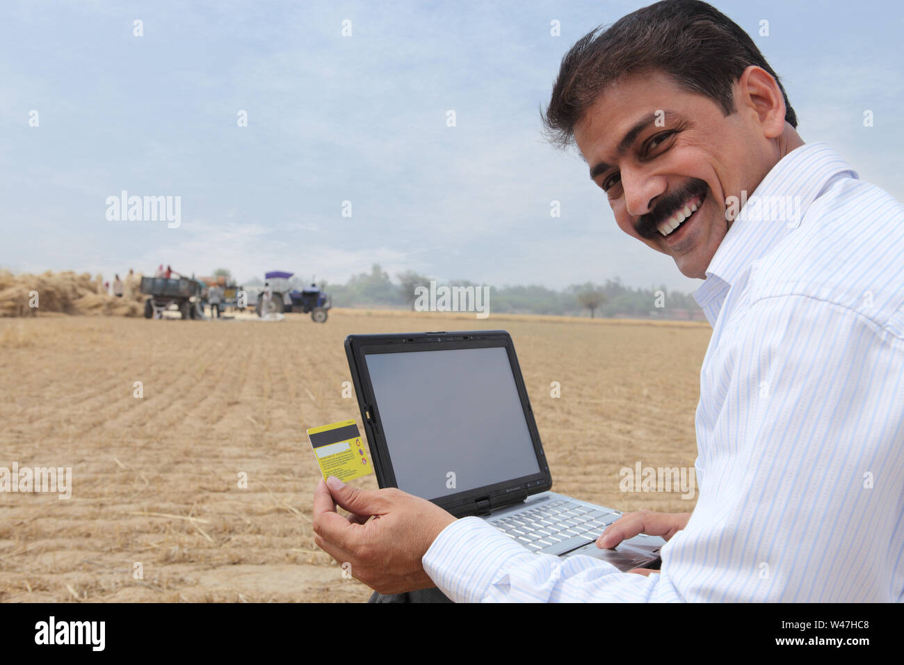 Rural indian man in office hi-res stock photography and images - Alamy