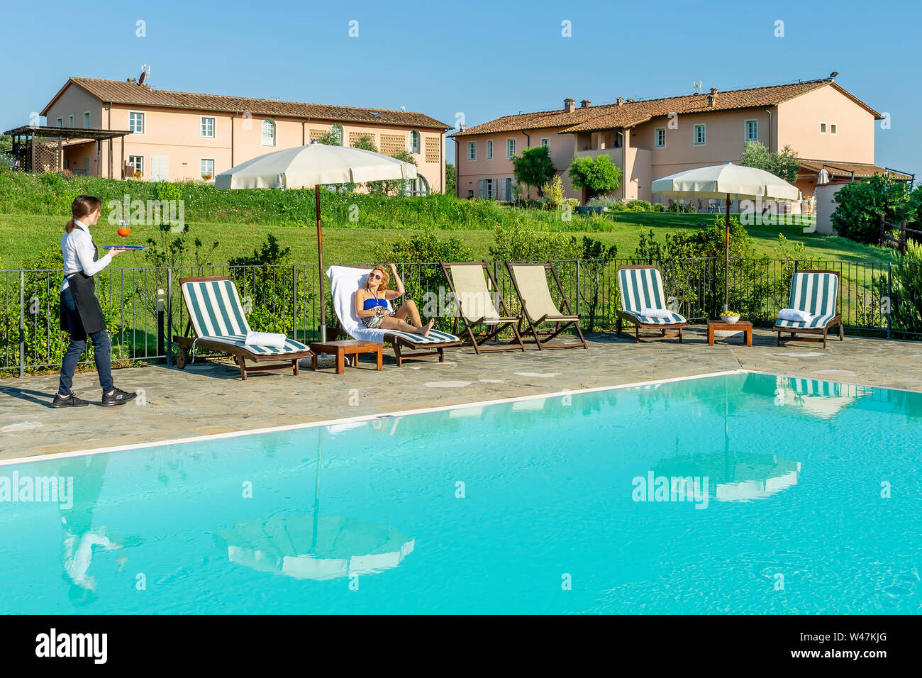 Cocktail waitress hi-res stock photography and images - Alamy