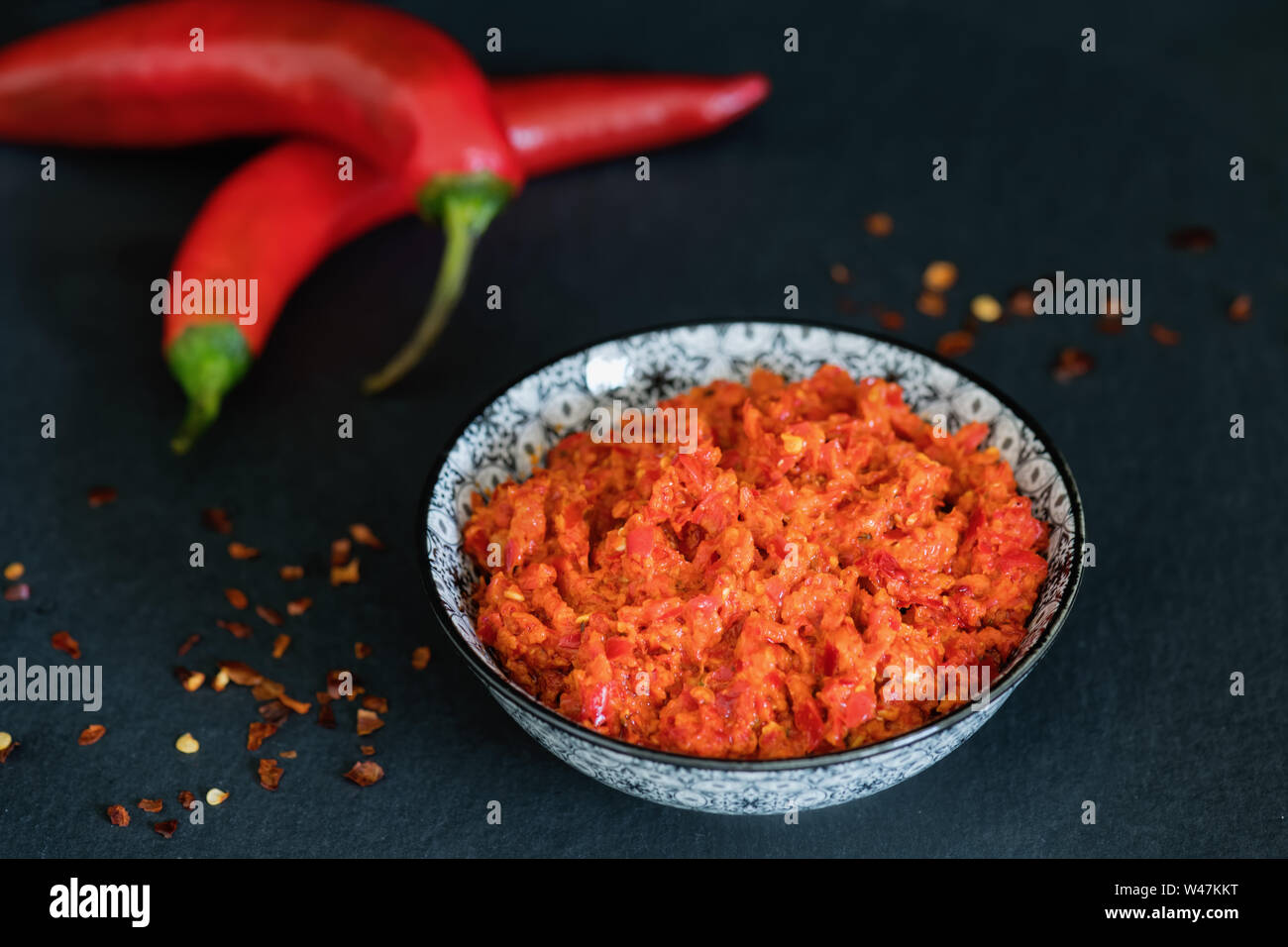 Traditional Maghrebi hot chili pepper sauce harissa on a stone ...