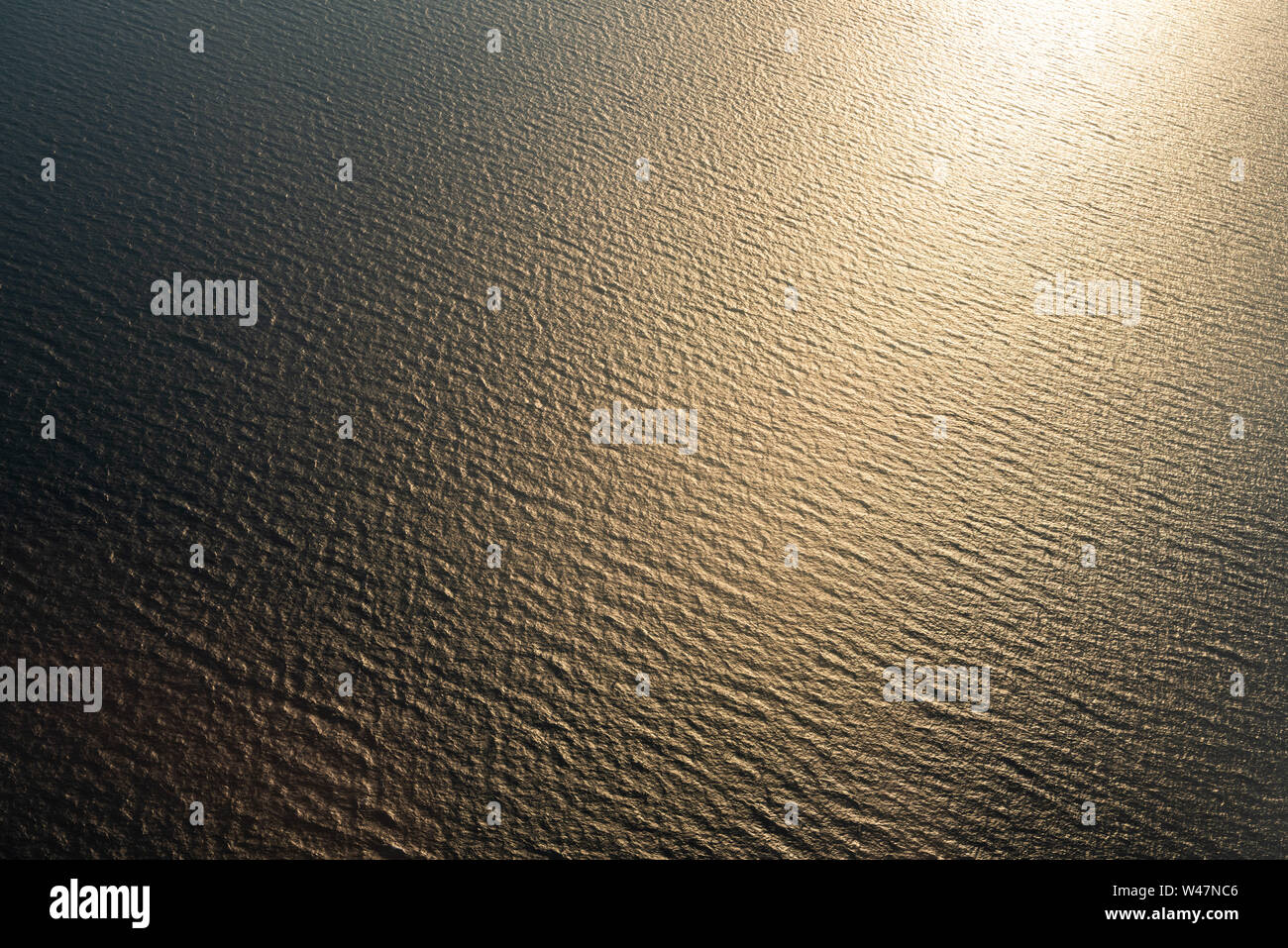 Ocean in golden light hi-res stock photography and images - Alamy