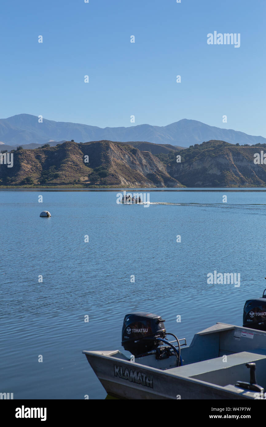 Early morning Fishermen in a fishing boat on Lake Cachuma, Santa ...