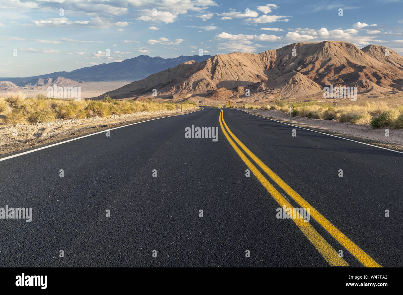 Beautiful, lonely road and mountains, Highway 127, shown south of ...