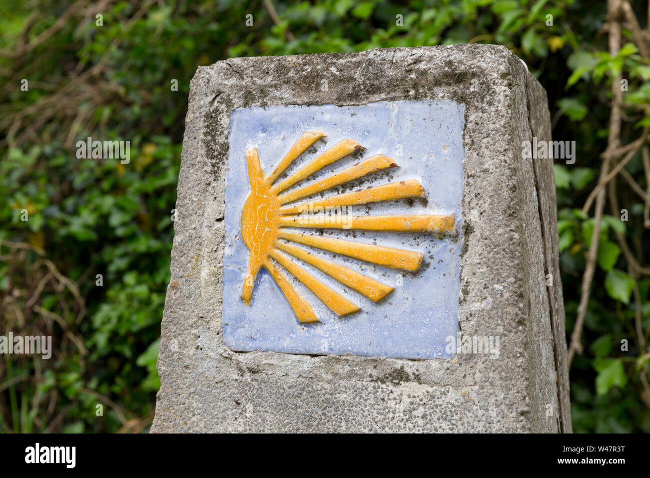 Traditional marker along the Camino del Norte in the village of Cuerres ...