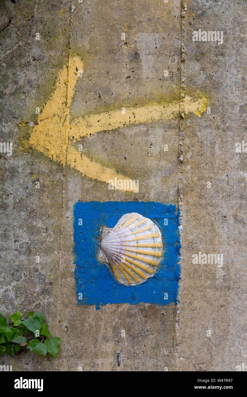 Traditional marker along the Camino del Norte in the village of Cuerres ...