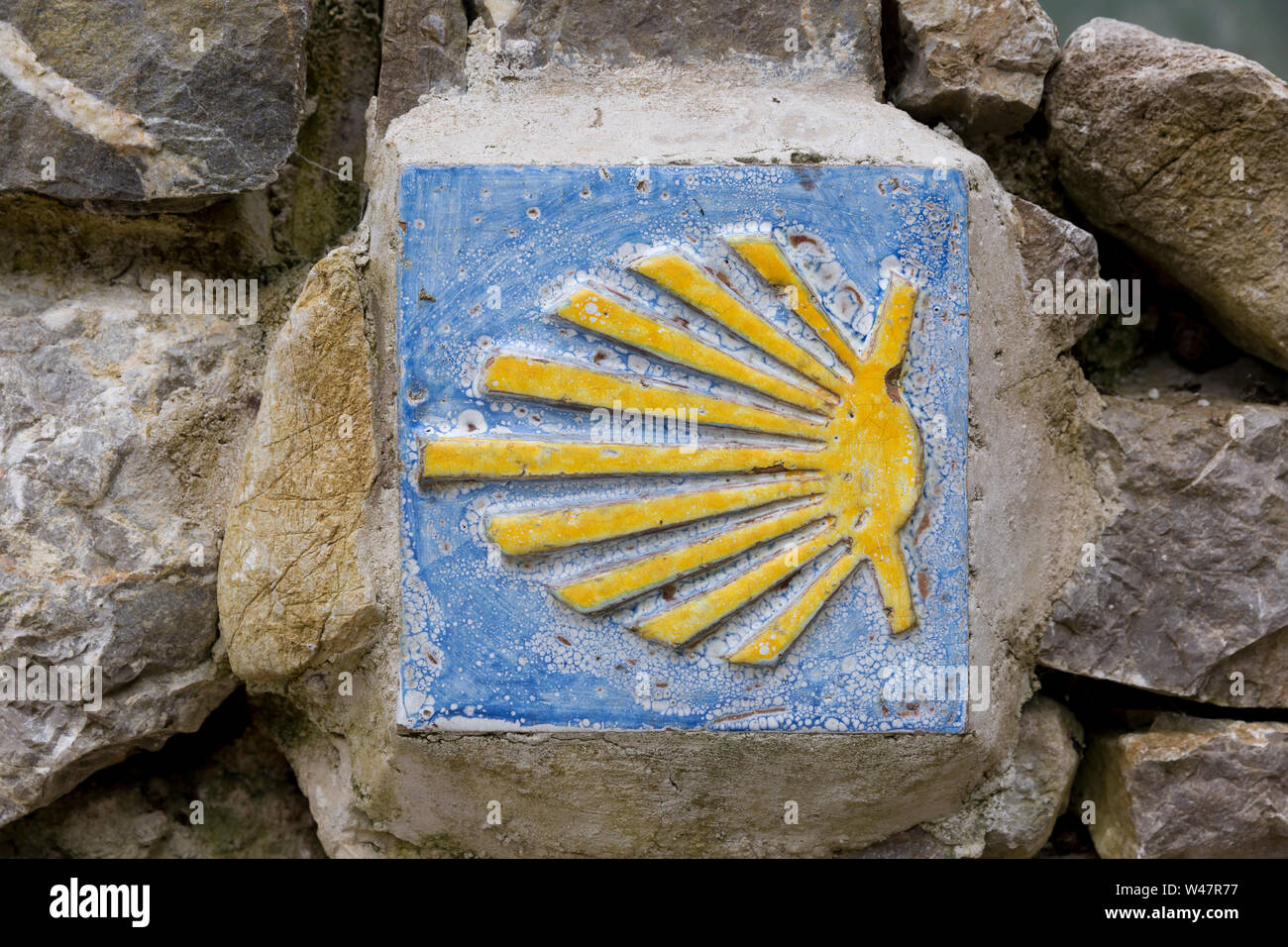Traditional marker along the Camino del Norte in the village of Cuerres ...