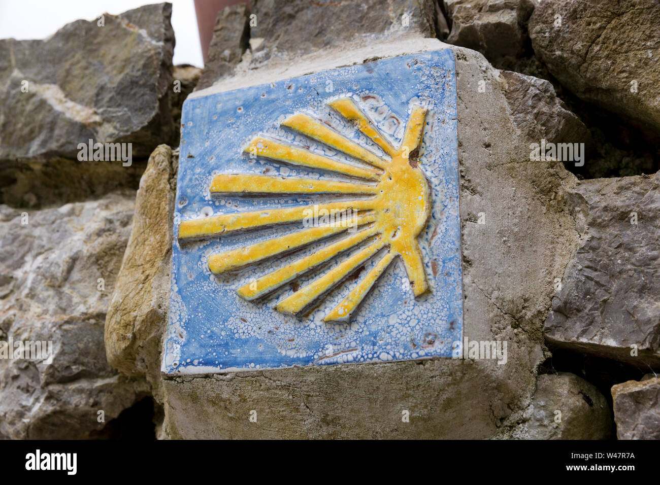 Traditional marker along the Camino del Norte in the village of Cuerres ...