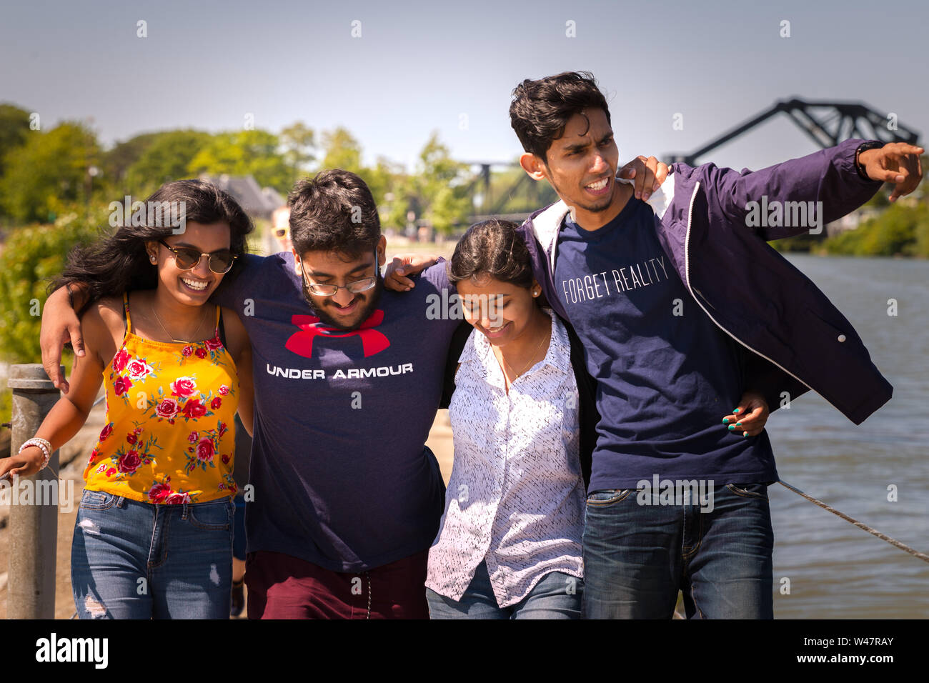 Group of friends hanging out and having fun Stock Photo - Alamy