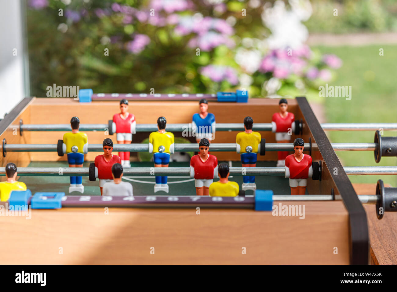 Small Table Football Game in Game Room Stock Photo - Alamy