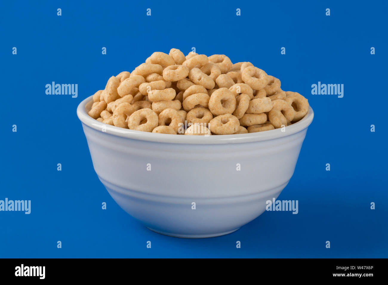 Honey Flavored Cereal in a White Bowl Stock Photo - Alamy