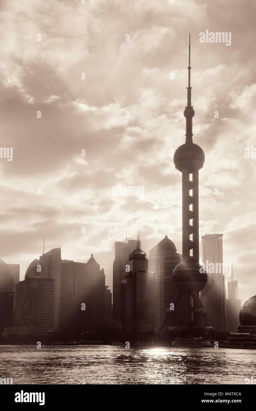 Shanghai morning with sunny sky and water reflections in China Stock ...