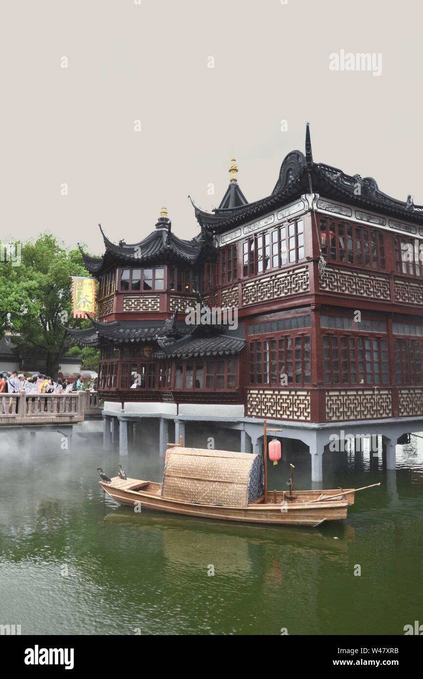 Replica of traditional wooden Chinese building - red ornate painted ...