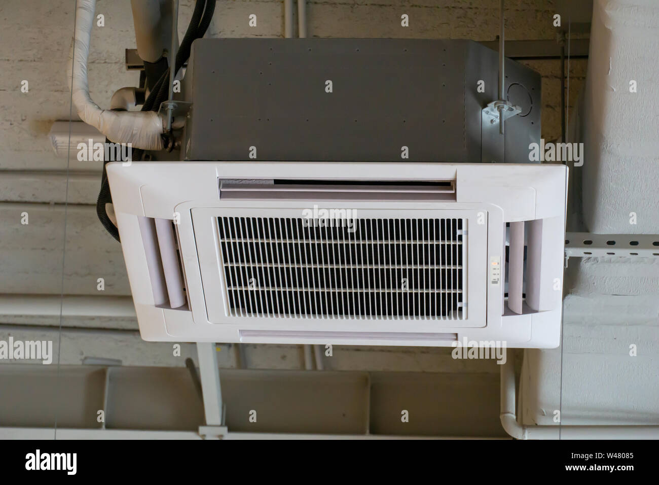 Air conditioning system installed on the ceiling Stock Photo - Alamy