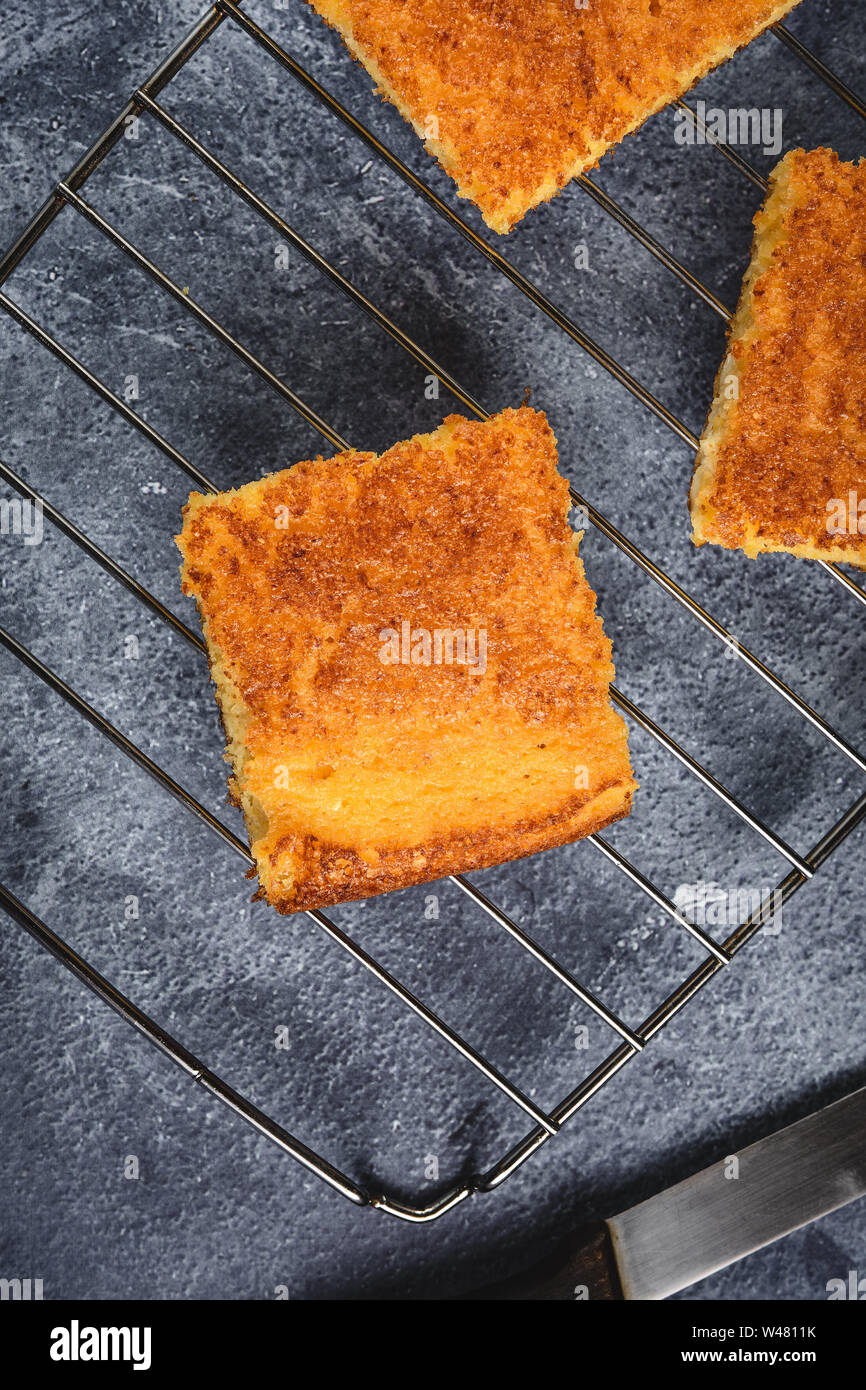 Yellow Corn Bread Squares Slices on Dark Rustic Background Stock Photo ...