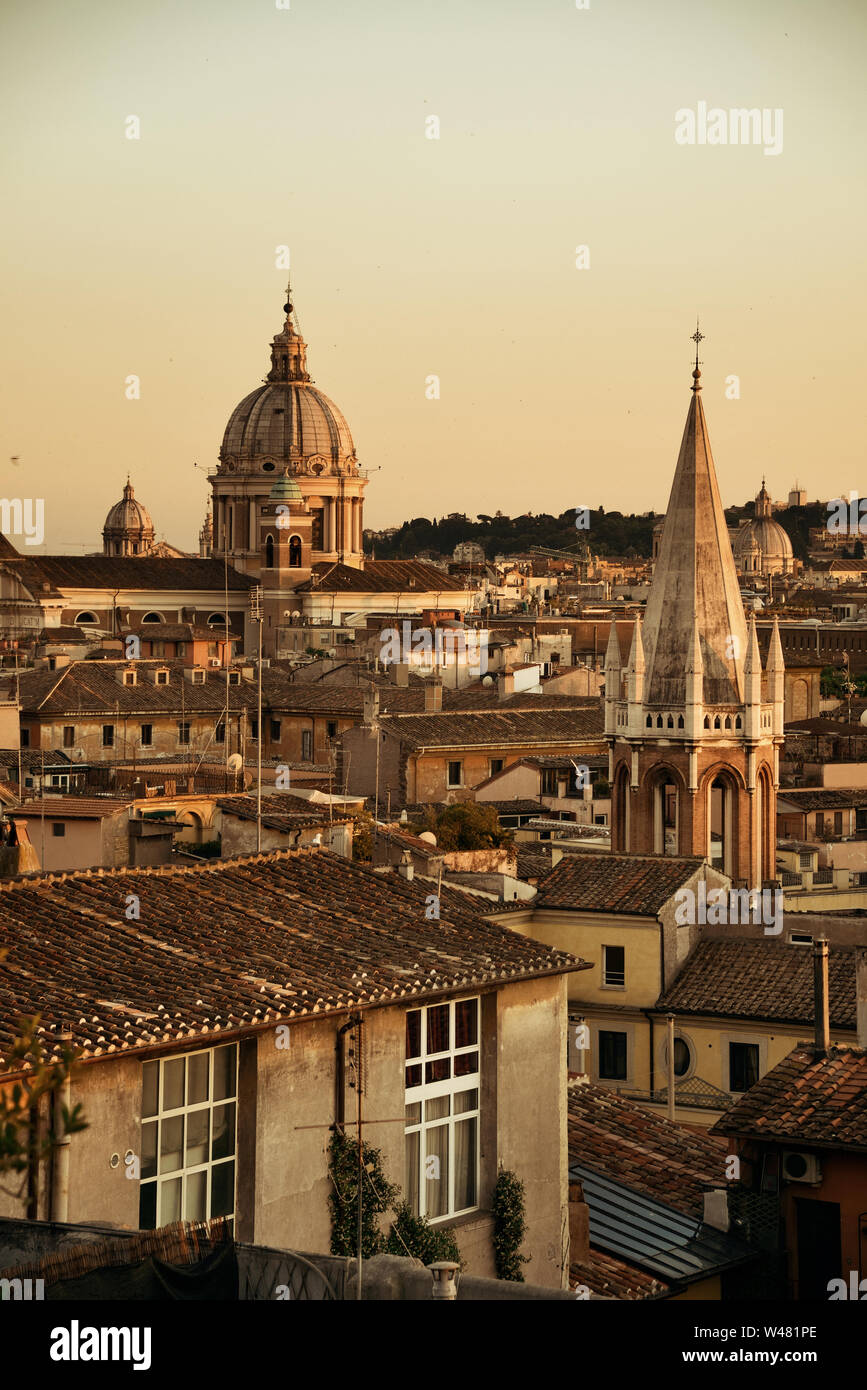 Rome rooftop view with ancient architecture in Italy at sunset moment ...