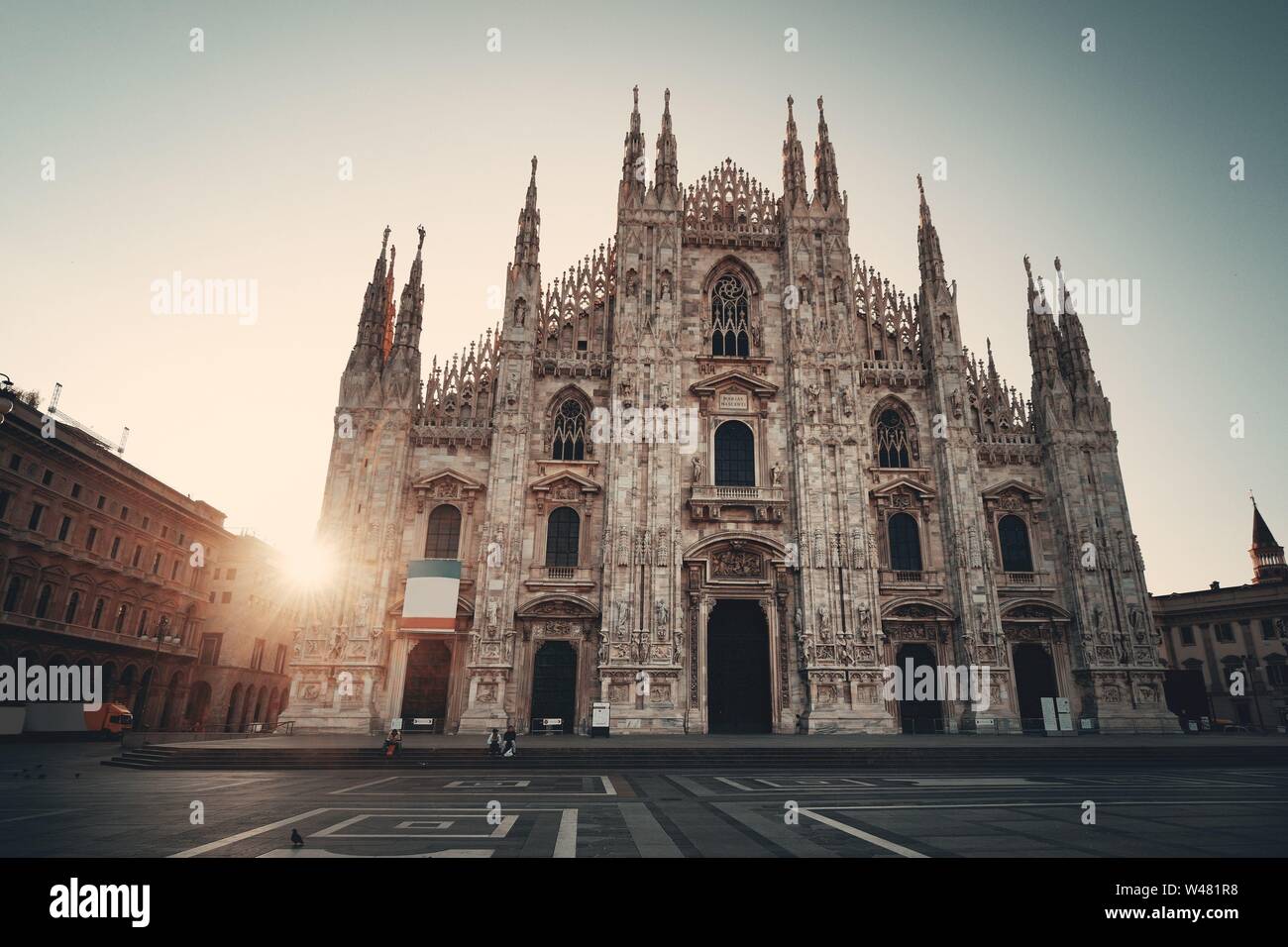 Cathedral Square sunrise in Milan city in Italy Stock Photo - Alamy