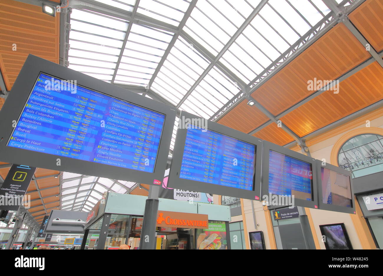 Train timetable display at Saint Lazare train station Paris France ...