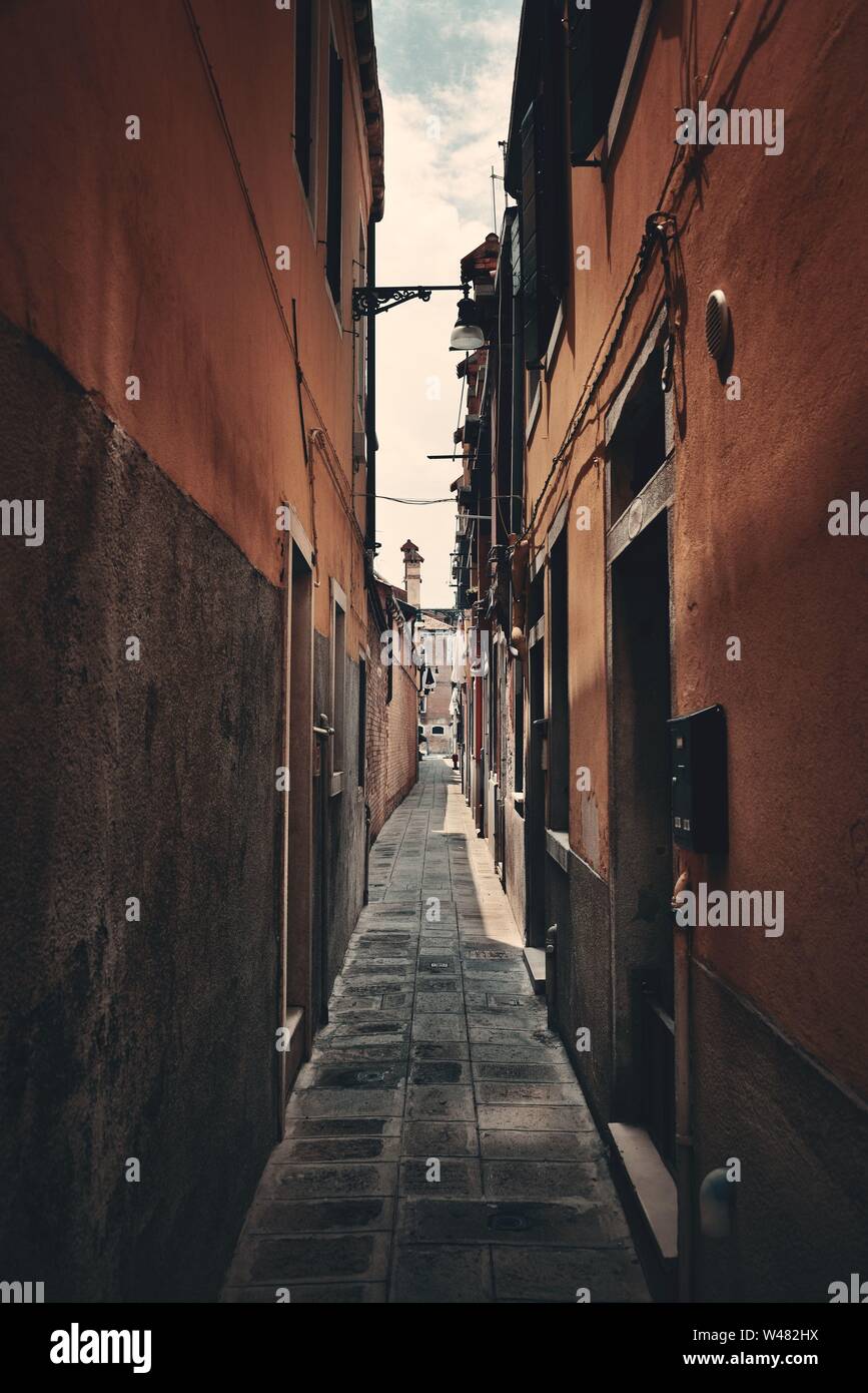 Alley view with historical buildings in Venice, Italy Stock Photo - Alamy