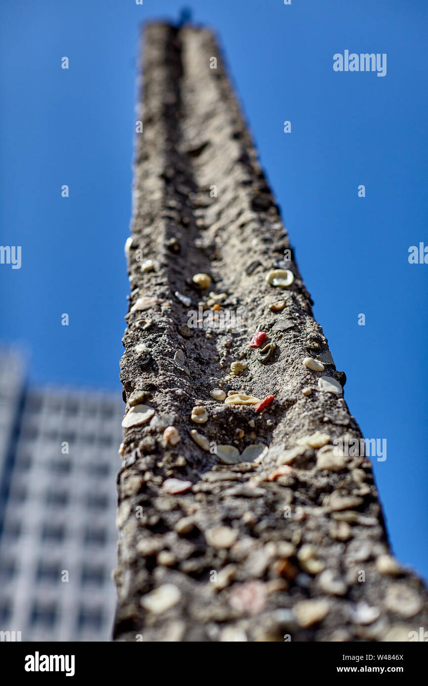 The Berlin Wall was a guarded concrete barrier that physically and ...