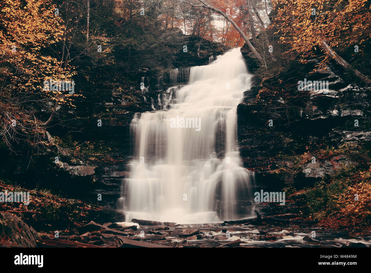 Autumn waterfalls in park with colorful foliage Stock Photo - Alamy