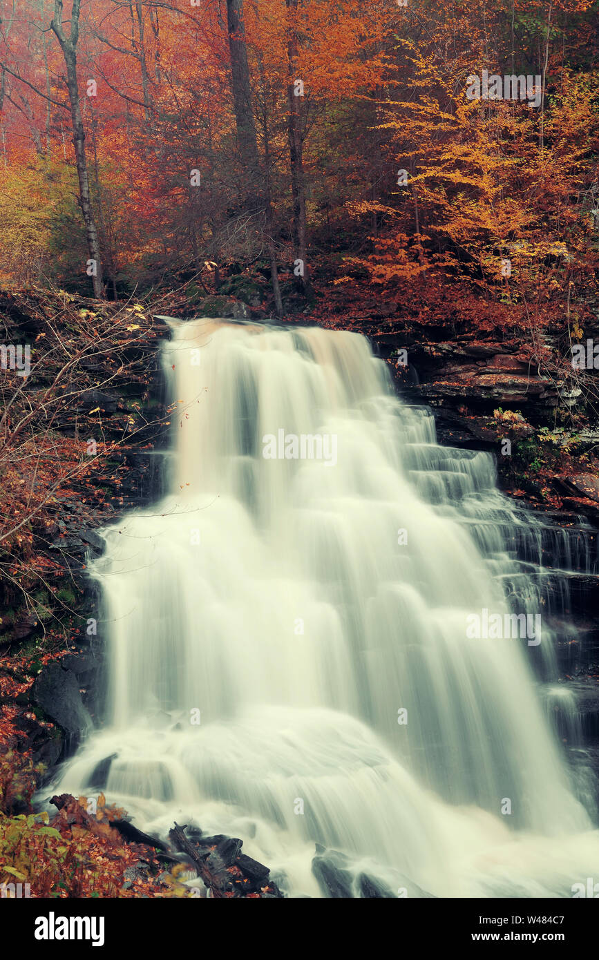 Autumn waterfalls in park with colorful foliage Stock Photo - Alamy