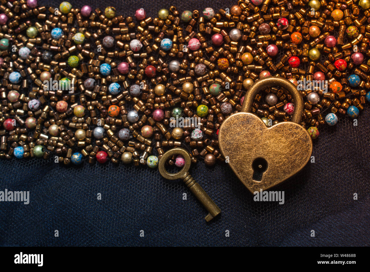 Heart shaped lock and key on an abstract background Stock Photo - Alamy