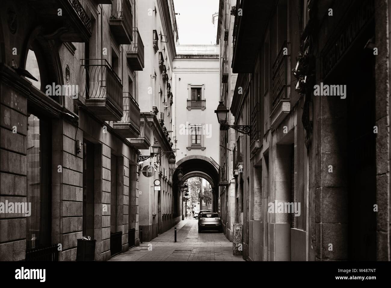 Street view of small alley with historic buildings in Madrid, Spain ...