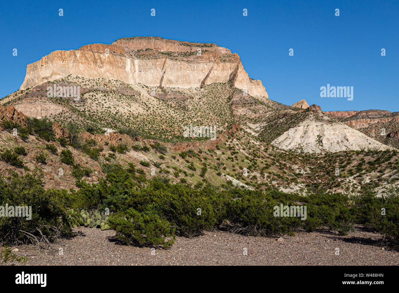 Dikes slash through thick tuff deposits of Three Dike Hill, Texas Stock ...